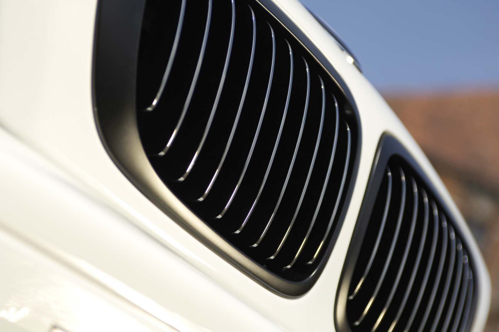 Uncovering the Inspiration Behind Iconic Grille Designs - In The Garage ...