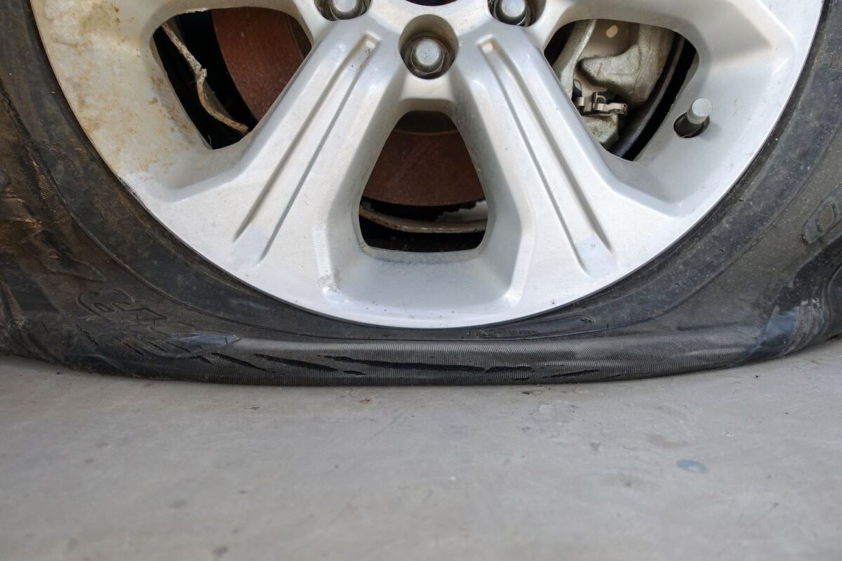 How Far Can You Drive on a Flat? - In The Garage with CarParts.com