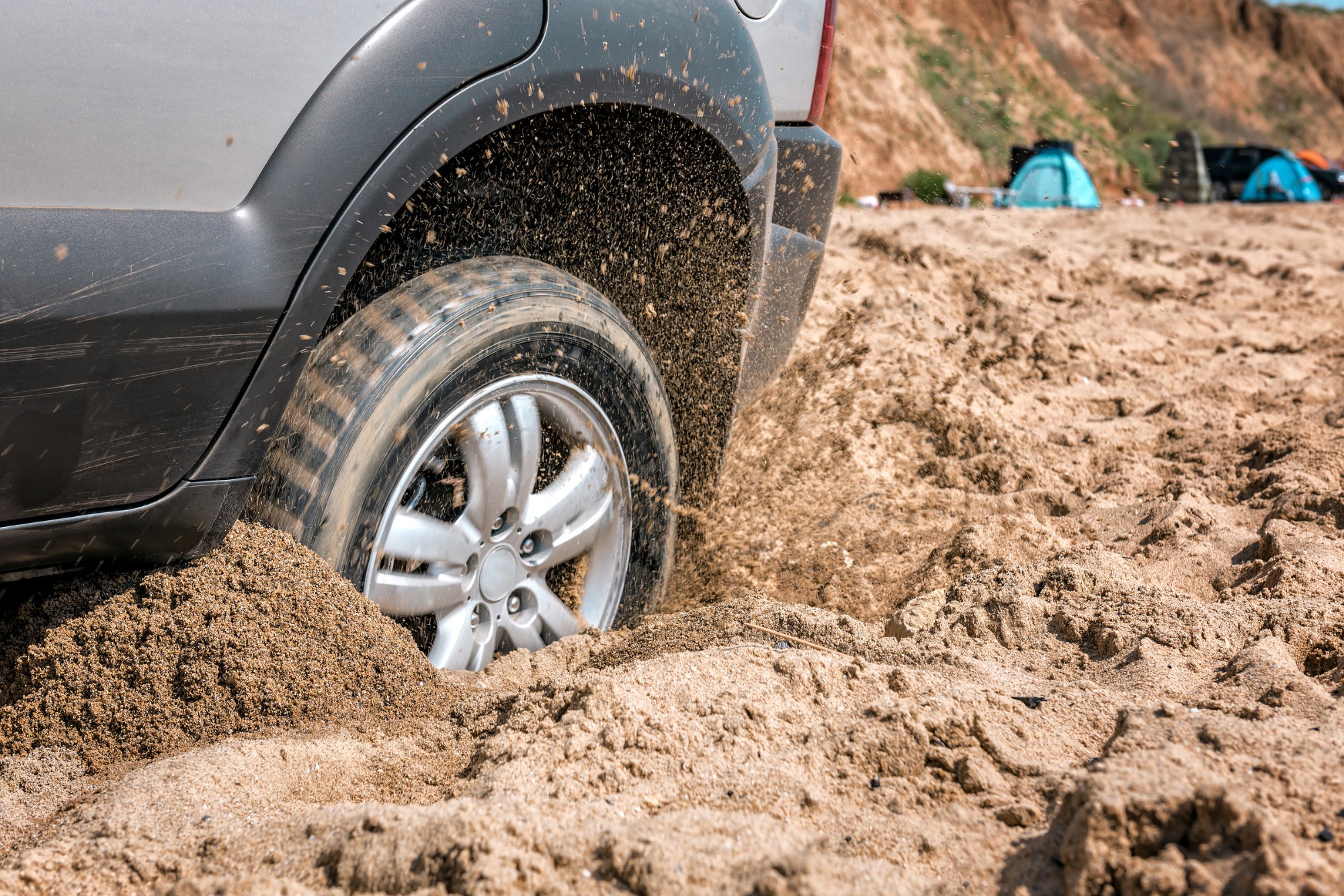 Muddy Mishaps: How to Handle a Car Stuck In Mud - In The Garage with ...