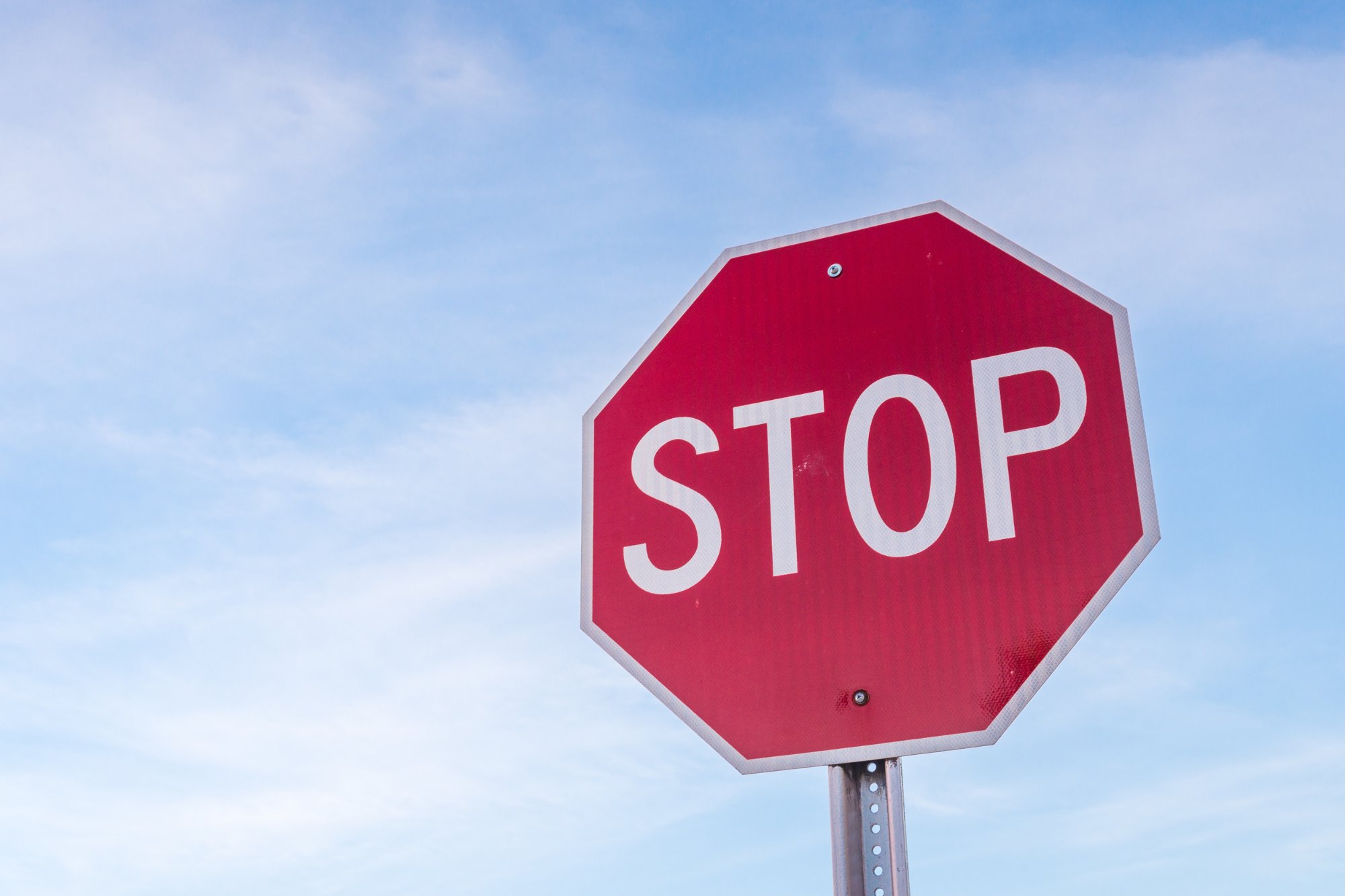 How Long Should You Stop at a Stop Sign? Plus Other Rules of the Road ...