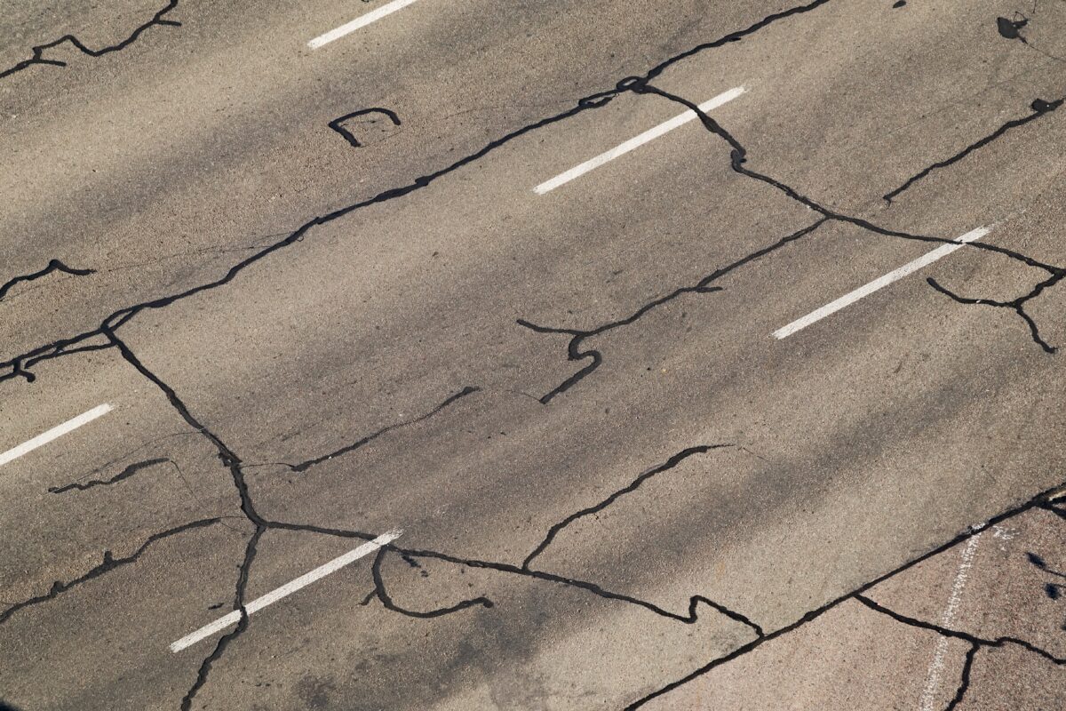 Crack Sealing: The Squiggly Lines on the Road - In The Garage with ...