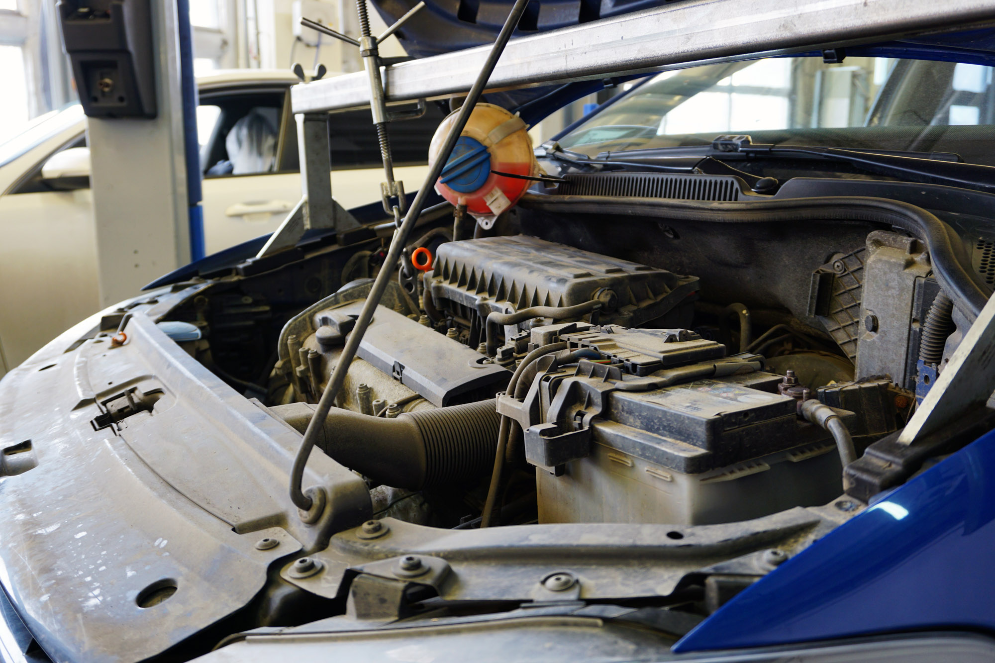 Swollen Car Battery: Causes and Other Related FAQs - In The Garage with ...