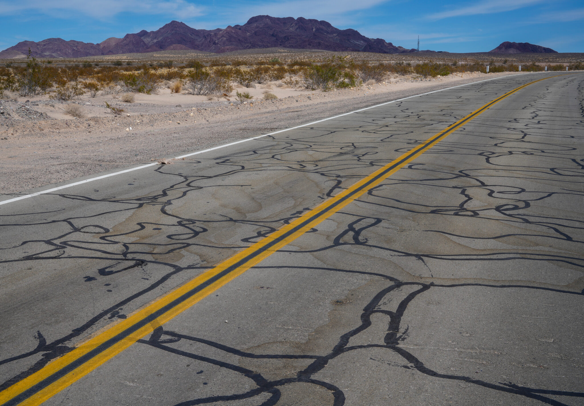Crack Sealing: The Squiggly Lines on the Road - In The Garage with ...
