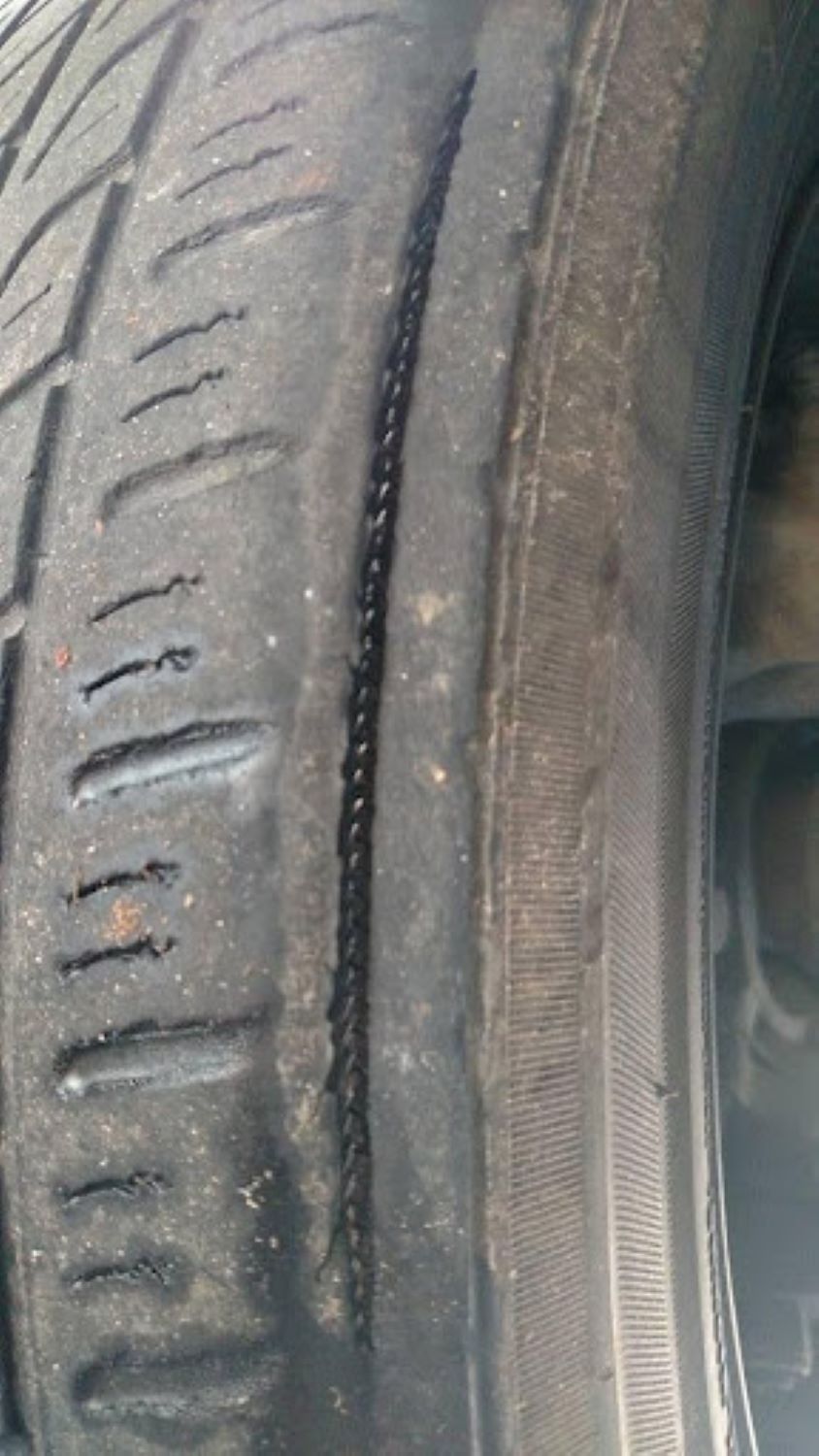 What To Do When Metal Is Showing In Your Tire - In The Garage with ...